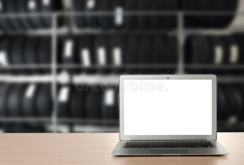 Modern Laptop on Table in Auto Store Stock Photo - Image of center ...