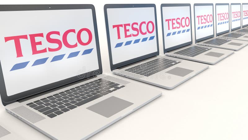 Modern Laptops with Tesco Logo. Computer Technology Conceptual ...