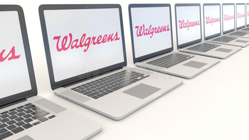 Modern Laptops with Walgreens Logo. Computer Technology Conceptual ...