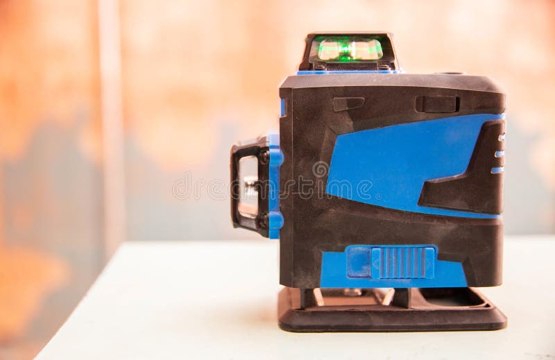 Modern Laser Level on the Background of Walls with Concrete Contact ...