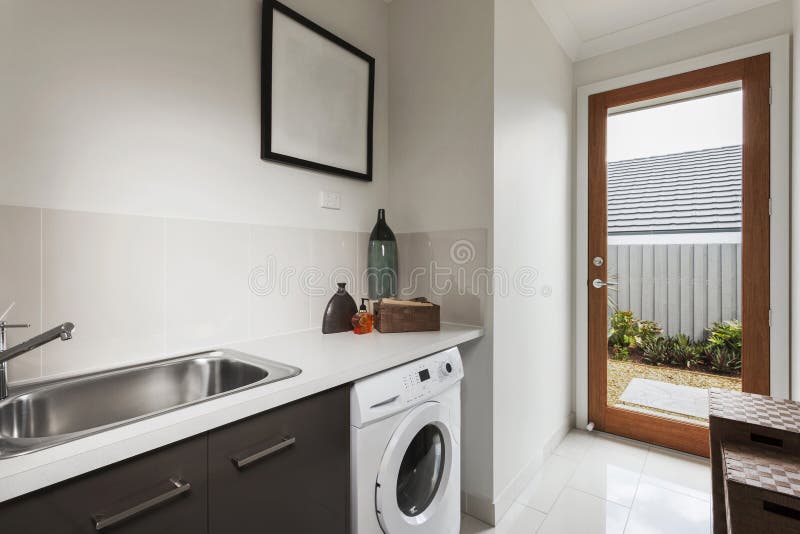 A Modern Laundry Room in Luxury House Stock Photo - Image of interior ...