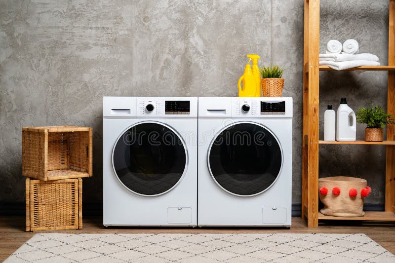 Modern Laundry Room with White Washing Machines and Greenery Stock ...