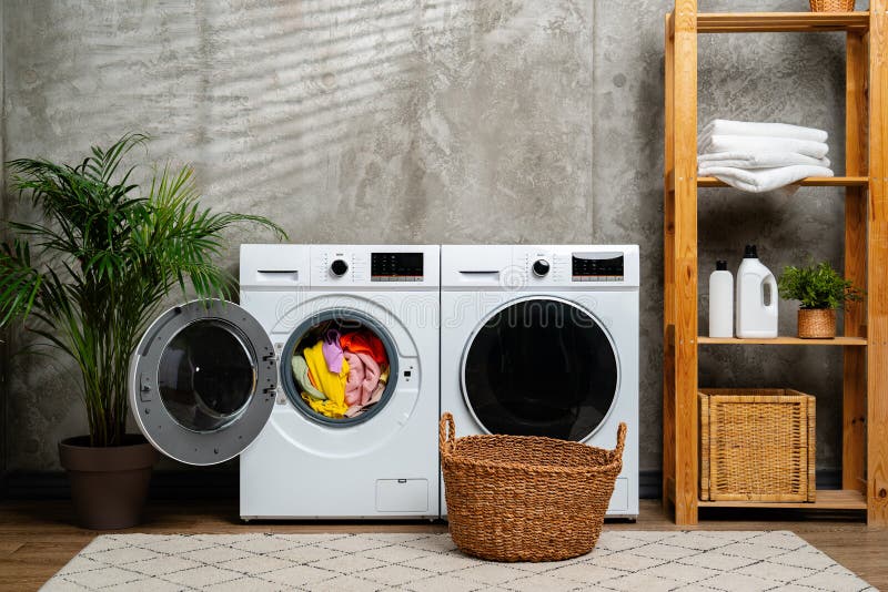 Modern Laundry Room with White Washing Machines and Greenery Stock ...