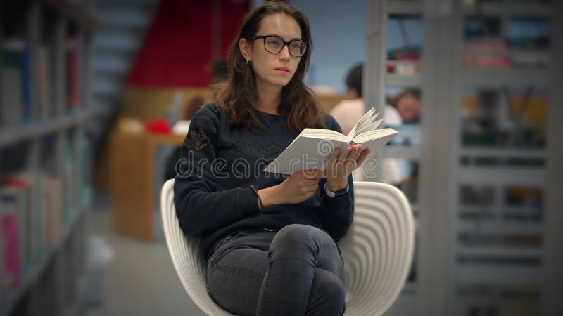 An Engaged and Focused Reader in a Contemporary Library Setting with ...