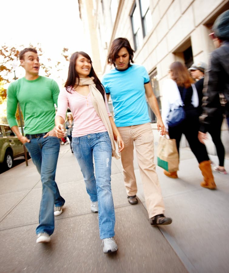 Modern Lifestyles - Three Friends Walking Stock Image - Image of ...