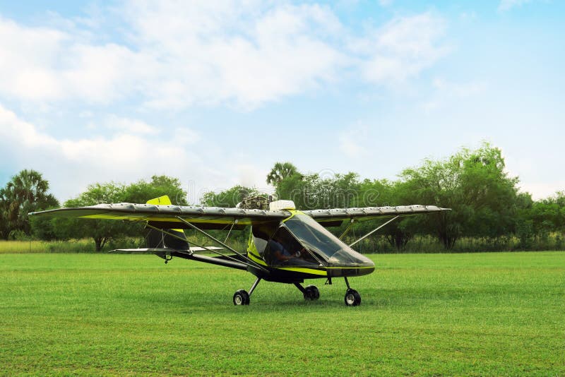 Modern Light Aircraft on Green Grass Outdoors Stock Photo - Image of ...