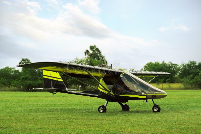 Modern Light Aircraft on Green Grass Outdoors Stock Image - Image of ...