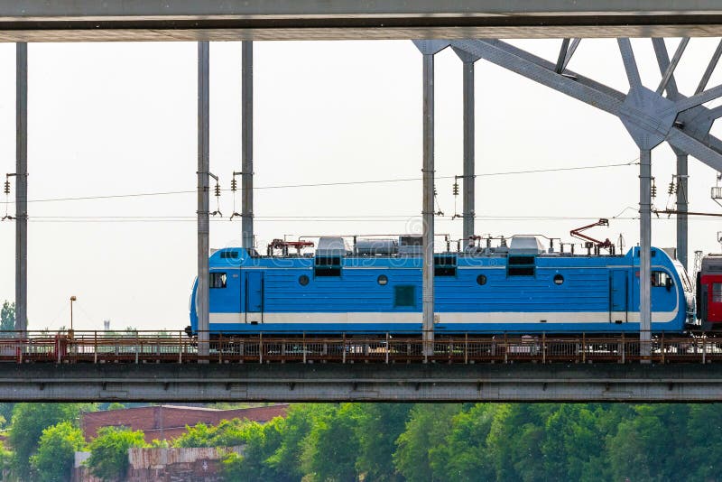 Modern Light Blue Electric Locomotive of Train on Bridge Stock Photo ...