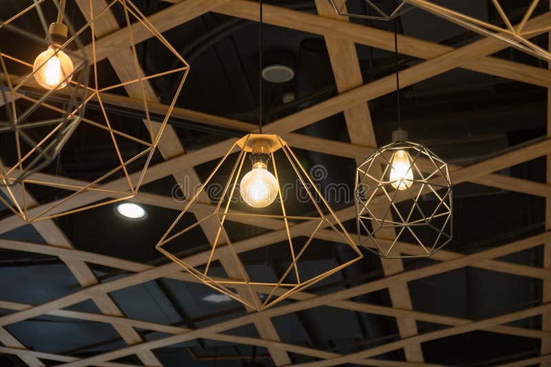 Modern Lightbulbs Protected by Wire Hanging from Ceiling Stock Image ...