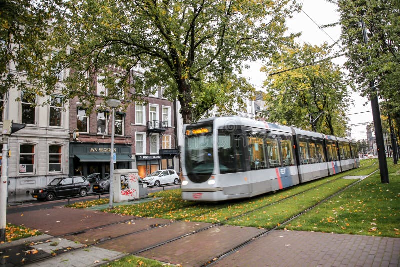 Modern Light Rail City Tram Passing through the City of Rotterdam ...