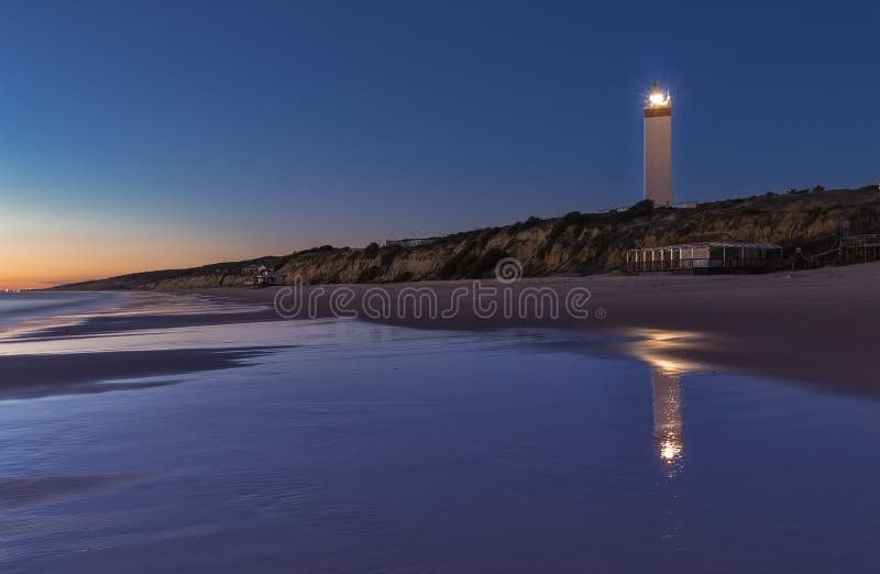 Modern lighthouse at night stock image. Image of remains - 202656845