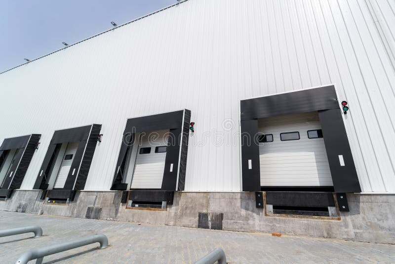 Modern Loading Dock Bays with Sealed Doors and Signals Stock Photo ...