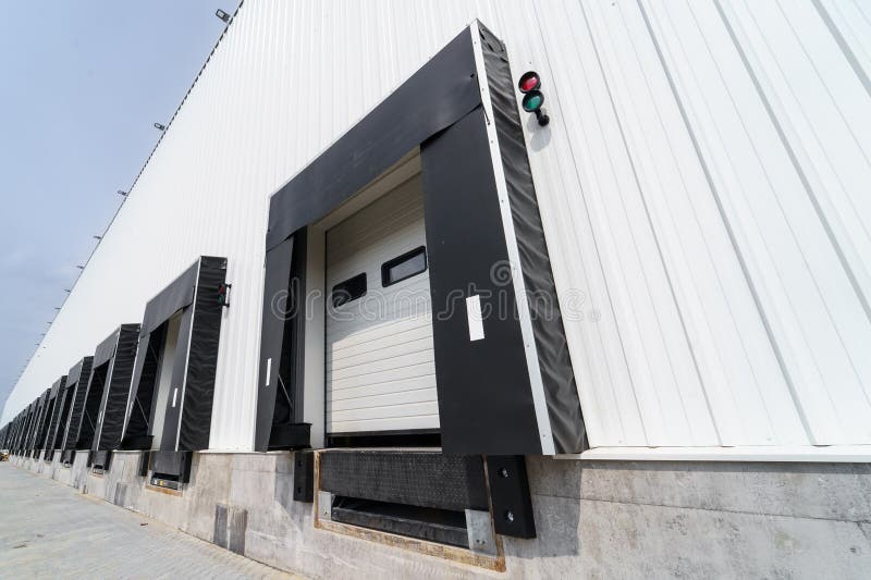 Modern Loading Dock Bays with Sealed Doors and Signals Stock Photo ...