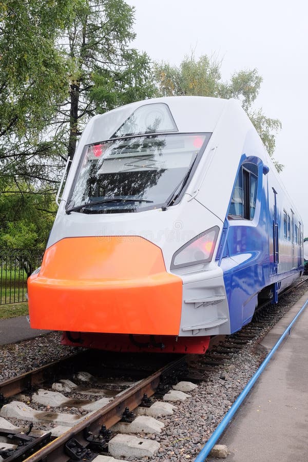 Modern Locomotive Carries Freight Train Past the Railway Station, the ...