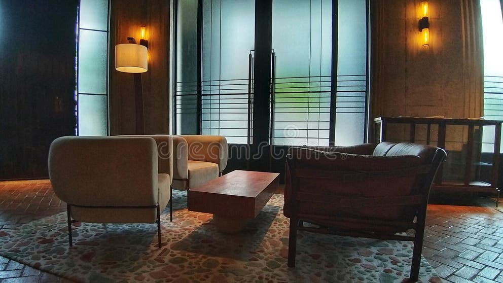 Modern Lounge with a Sleek, Rectangular Coffee Table Surrounded by ...