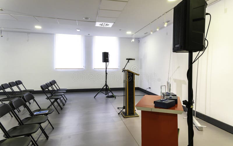 Modern and Luminous Room, Empty, Prepared for an Event. Lectern with ...