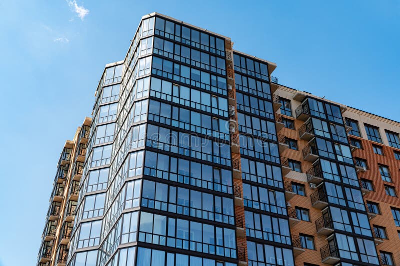 Modern Luxury Apartment Building. Facade of a Modern Apartment Building ...