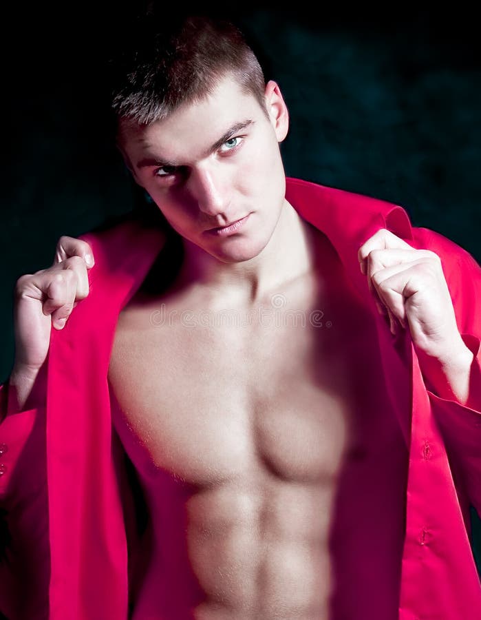 Modern Macho Man in Red Shirt is Posing Stock Photo - Image of stunt ...