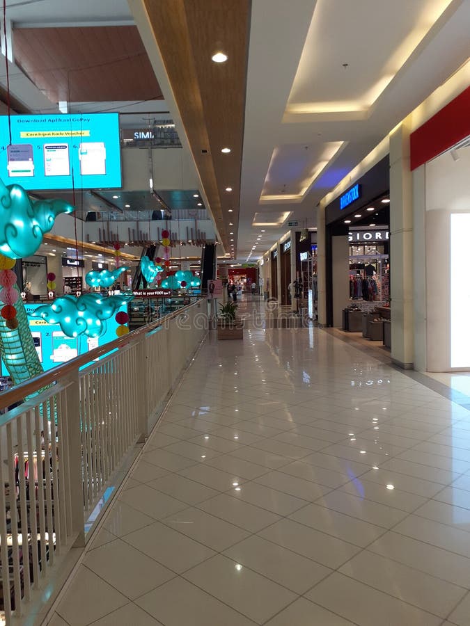 Modern Mall Interior with Festive Decorations and Bright Lighting Stock ...