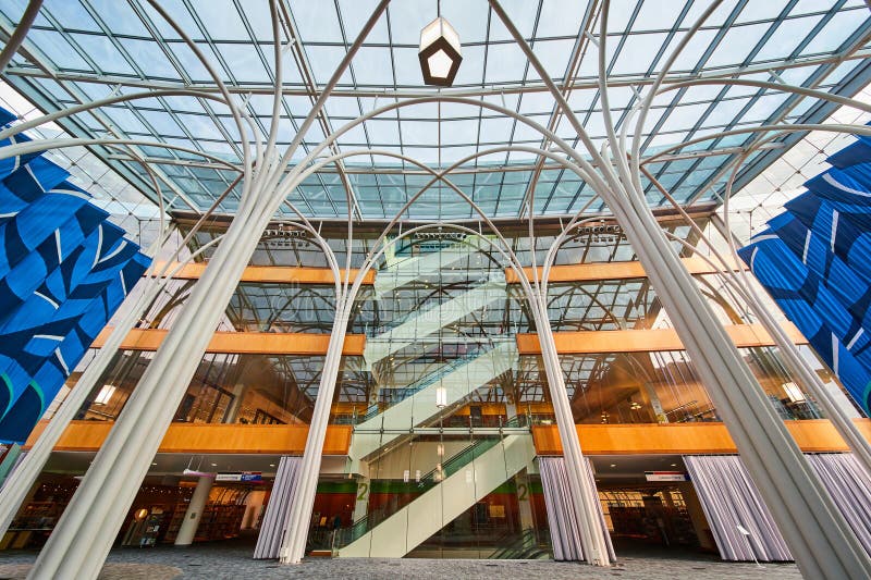 Modern Mall Interior with Glass Ceiling and Elevator Shaft ...
