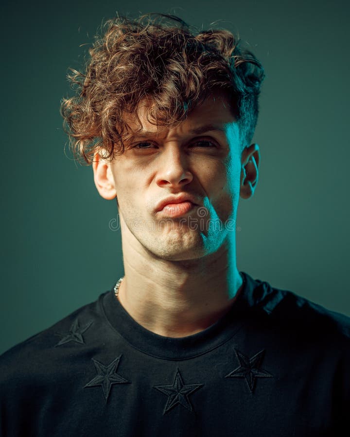 Modern Man Portrait in a Neon Light. Modern Haircut. Mysterious and ...