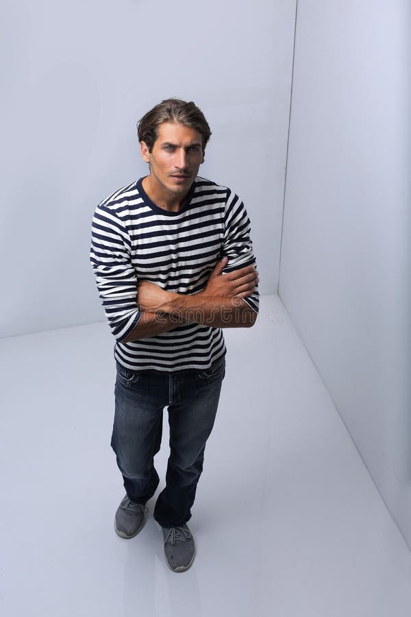 Modern Man Standing in the Corner of the White Room . Stock Photo ...