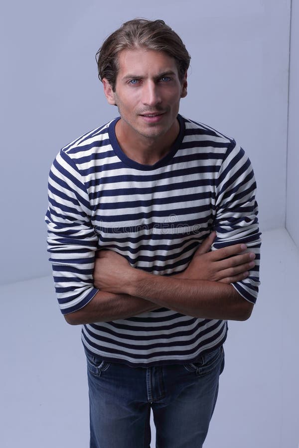 Modern Man Standing in the Corner of the White Room . Stock Image ...