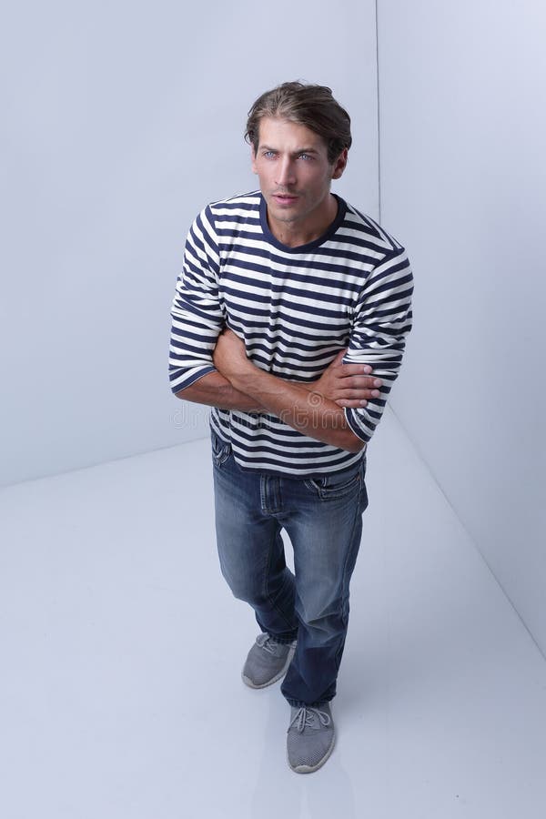 Modern Man Standing in the Corner of the White Room . Stock Photo ...