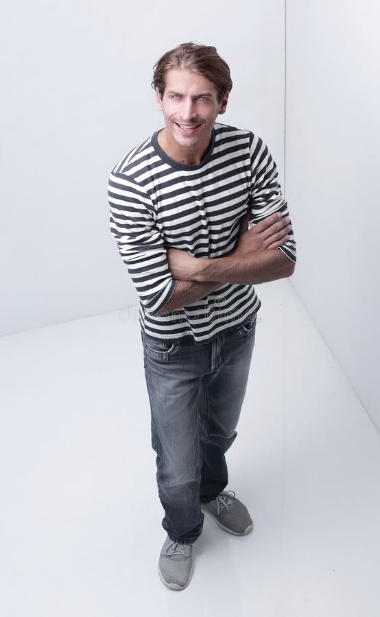 Modern Man Standing in the Corner of the White Room . Stock Photo ...