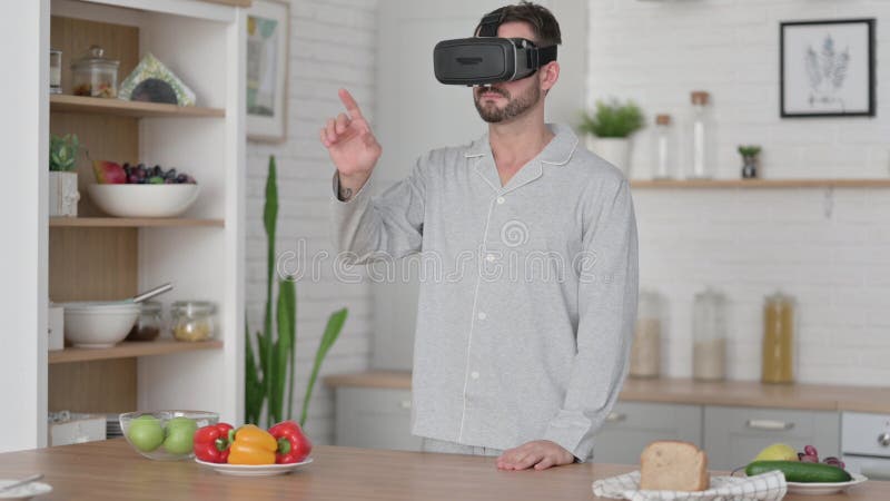 Modern Man Using VR Set while Standing in Kitchen Stock Photo - Image ...