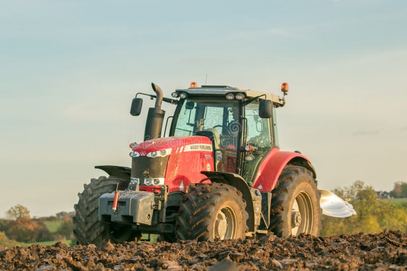 Modern Massey Ferguson Tractor Cultivating Field Stock Photos ...