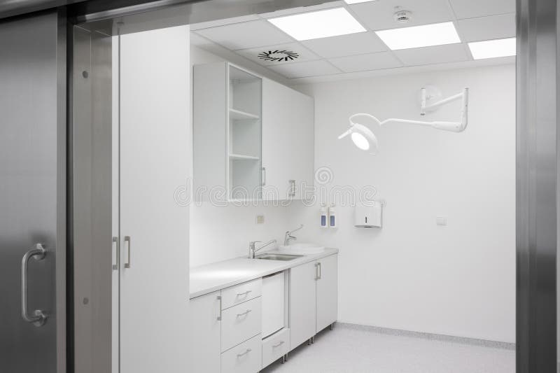 Modern Medical Examination Room with Sink and Cabinet Stock Photo ...