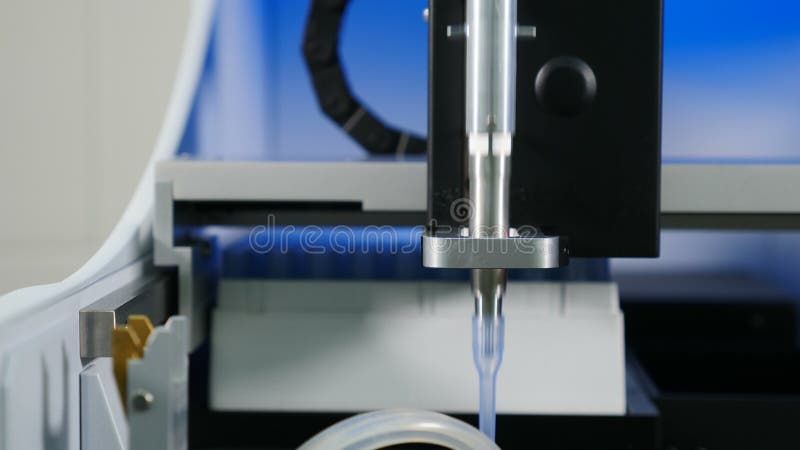 Automated Analysis Machine Used at Laboratory. Vertical Footage. Human ...