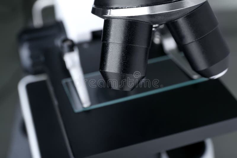 Modern Medical Microscope with Glass Slide, Closeup Stock Photo - Image ...