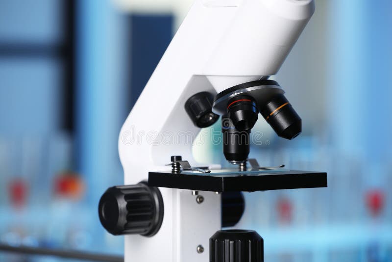 Modern Medical Microscope with Glass Slide in Laboratory, Closeup Stock ...