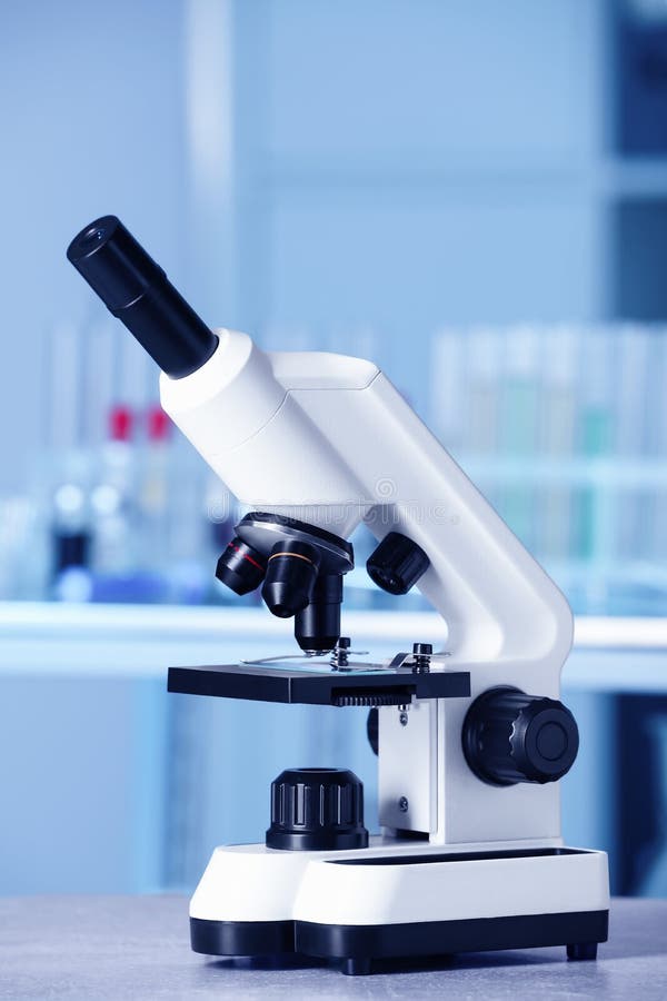 Modern Medical Microscope on Gray Table in Laboratory Stock Photo ...
