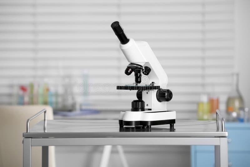 Modern Medical Microscope on Metal Table in Laboratory Stock Image ...