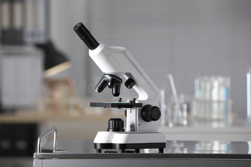 Modern Medical Microscope on Metal Table in Laboratory Stock Image ...