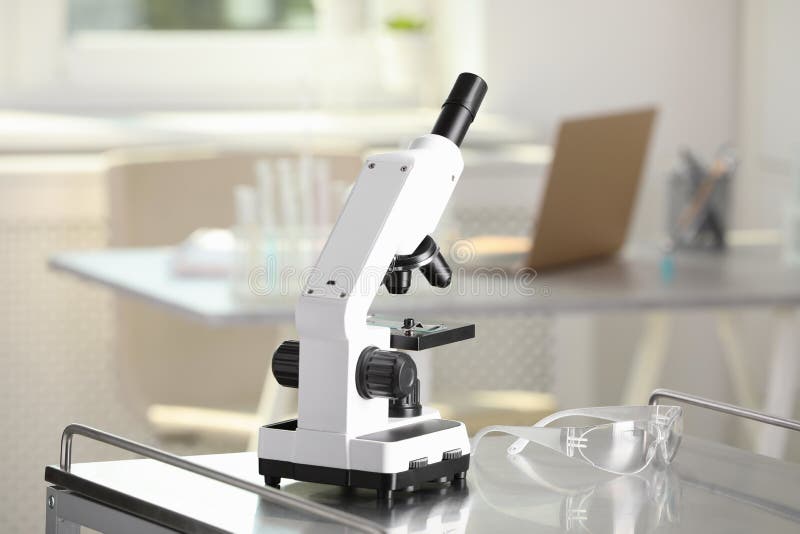 Modern Medical Microscope on Metal Table in Laboratory Stock Photo ...