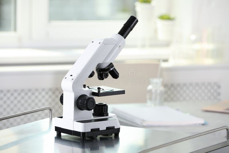 Modern Medical Microscope on Metal Table in Laboratory Stock Image ...