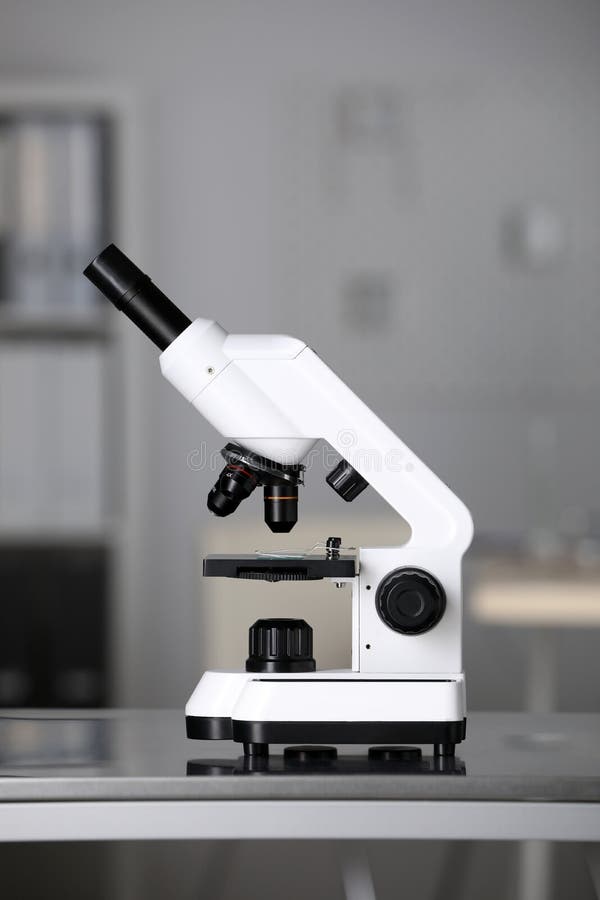 Modern Medical Microscope on Metal Table in Laboratory Stock Image ...