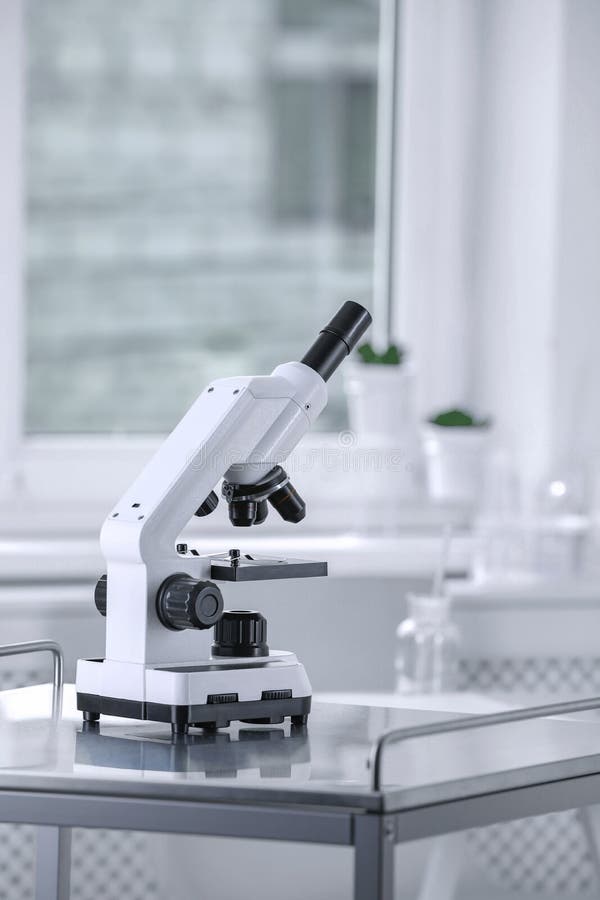 Modern Medical Microscope on Metal Table in Laboratory Stock Image ...