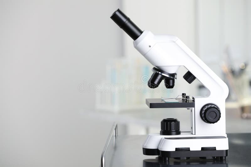 Modern Medical Microscope on Metal Table in Laboratory Stock Image ...
