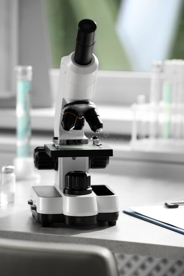 Modern Medical Microscope on Table in Laboratory Stock Photo - Image of ...