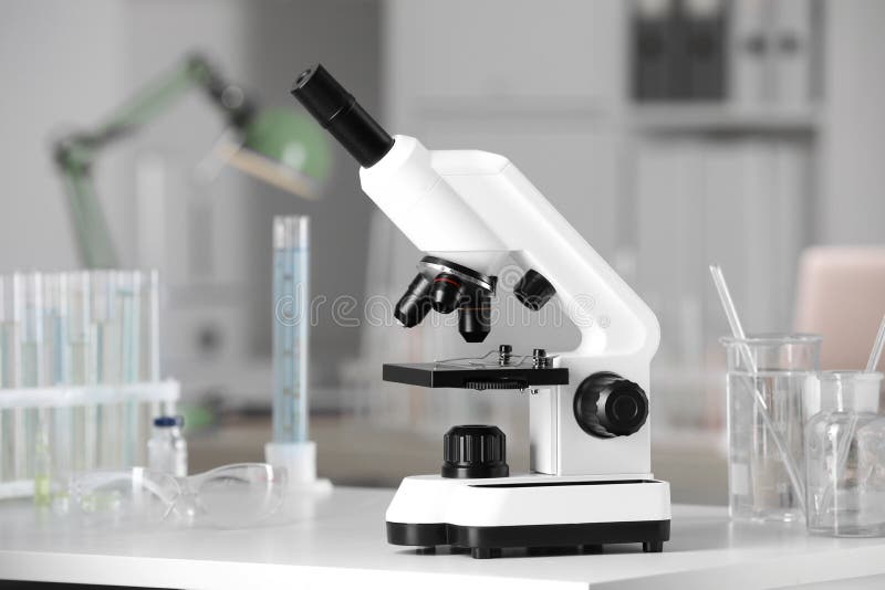 Modern Medical Microscope on White Table in Laboratory Stock Photo ...