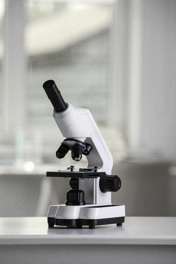 Modern Medical Microscope on White Table in Laboratory Stock Photo ...