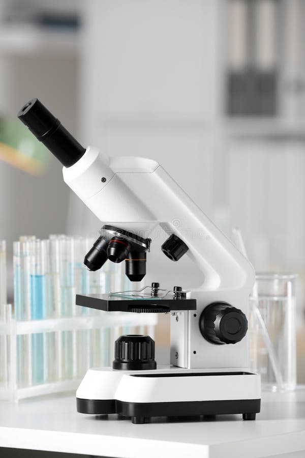 Modern Medical Microscope on White Table in Laboratory Stock Photo ...