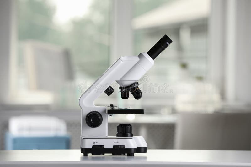 Modern Medical Microscope on White Table in Laboratory Stock Photo ...