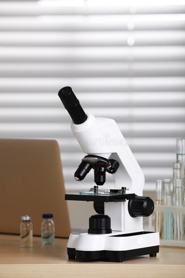 Modern Medical Microscope on Wooden Table in Laboratory Stock Image ...