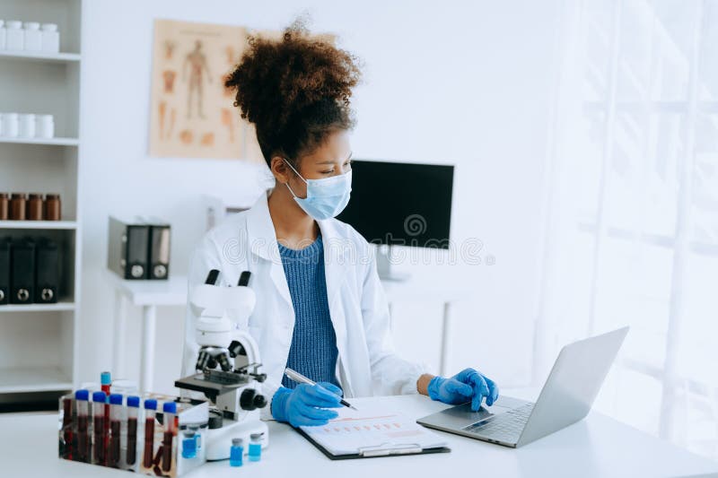 Modern Medical Research Laboratory. African Female Scientist Working ...